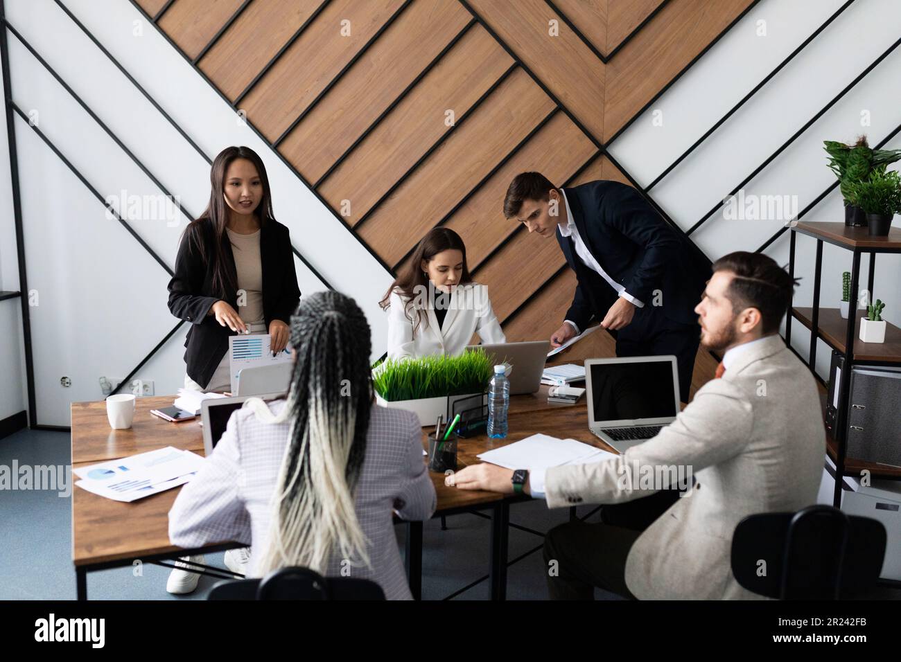 meeting with the head and employees of the startup company Stock Photo ...