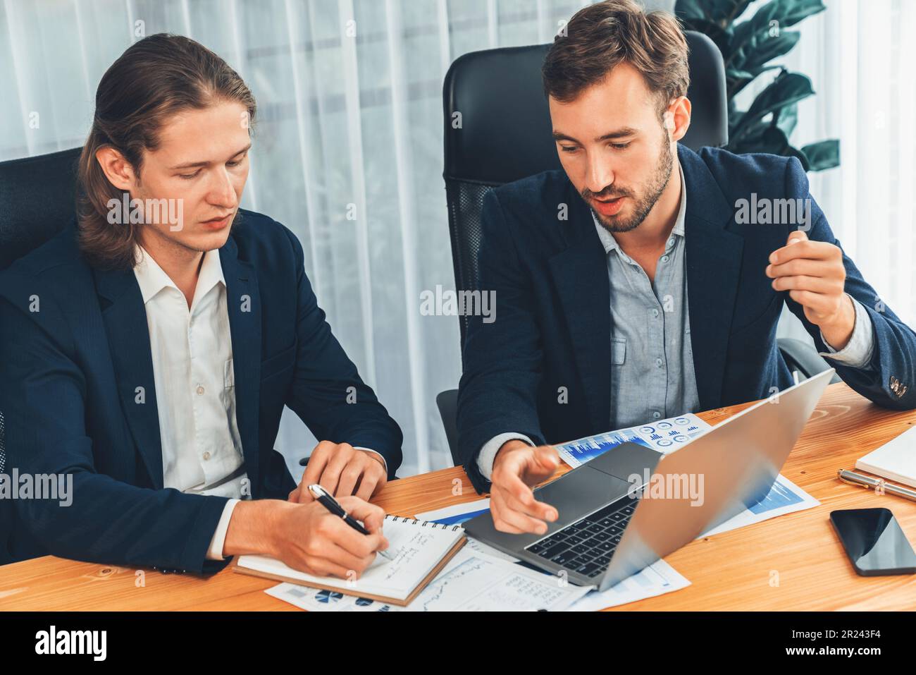 Busy analyst team in office analyzing financial data analysis for ...