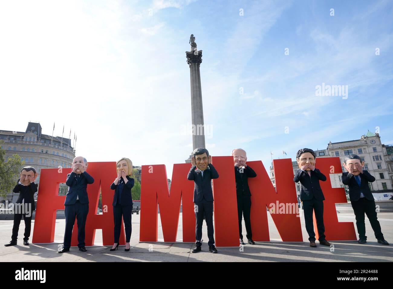 Oxfam's satirical 'big heads' of the G7 leaders pose in Trafalgar ...