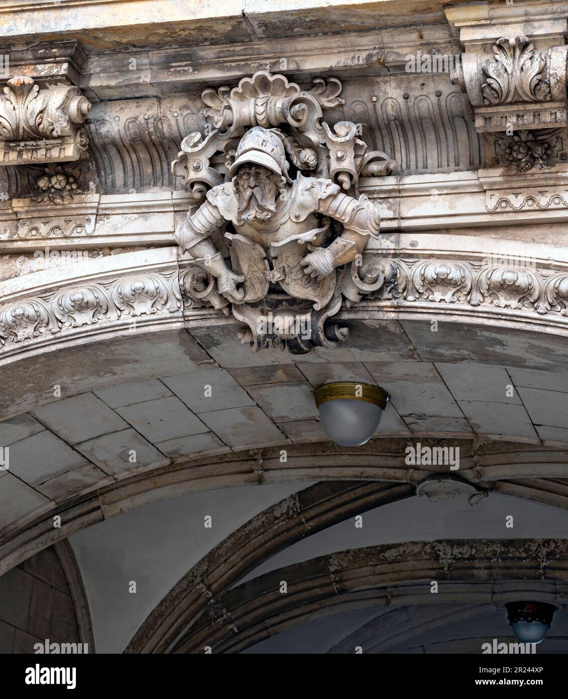 Bearded figure on the facade above the archway at the Georgen building ...