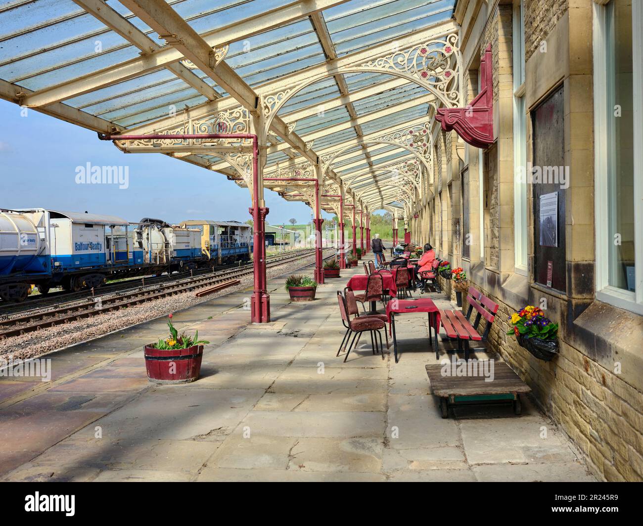 Platform with outdoor seating for cafe at Hellifield Railway Station ...