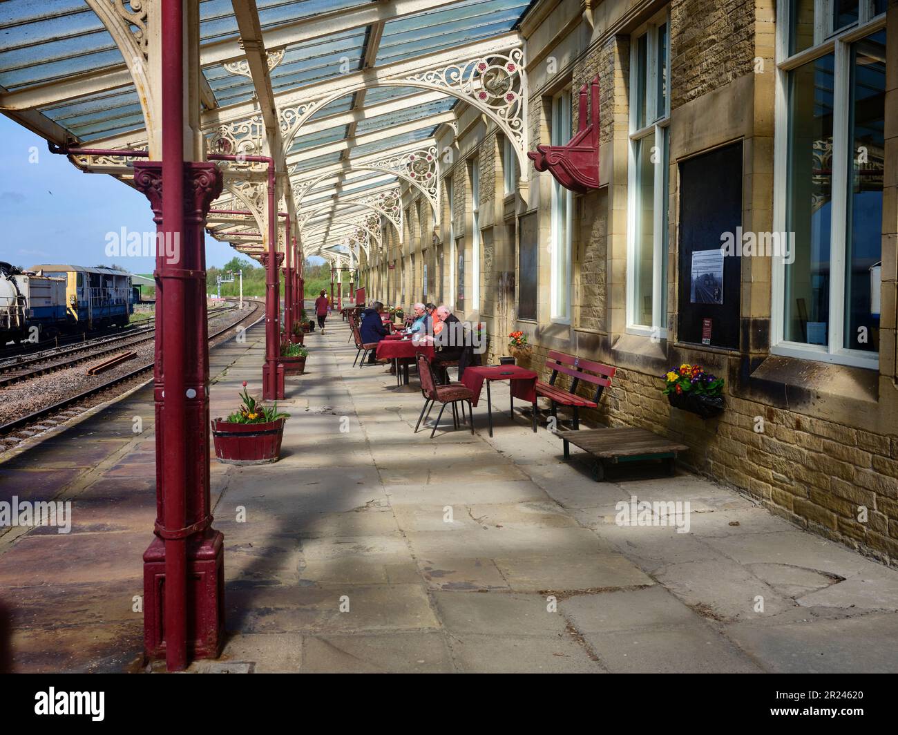 Platform with outdoor seating for cafe at Hellifield Railway Station ...