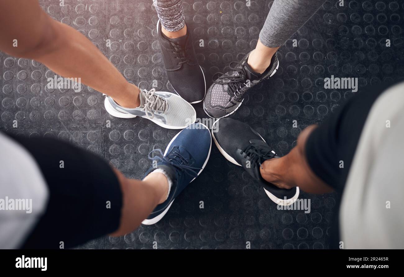 To get fit youve got to get started. a group of people standing ...