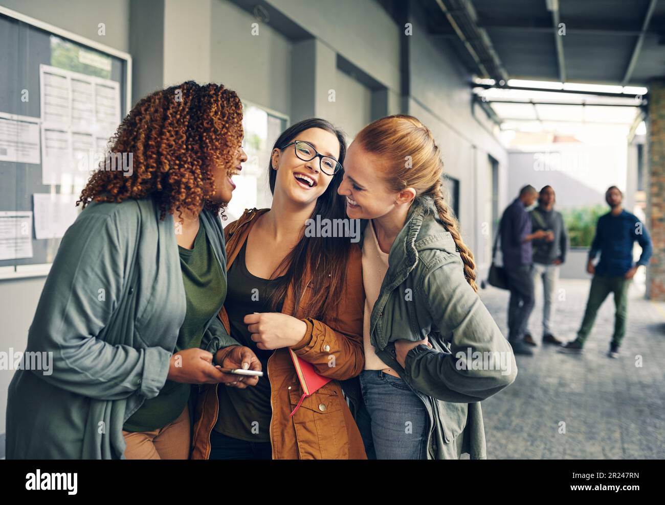 Laughing, conversation and girl friends together outside a building ...