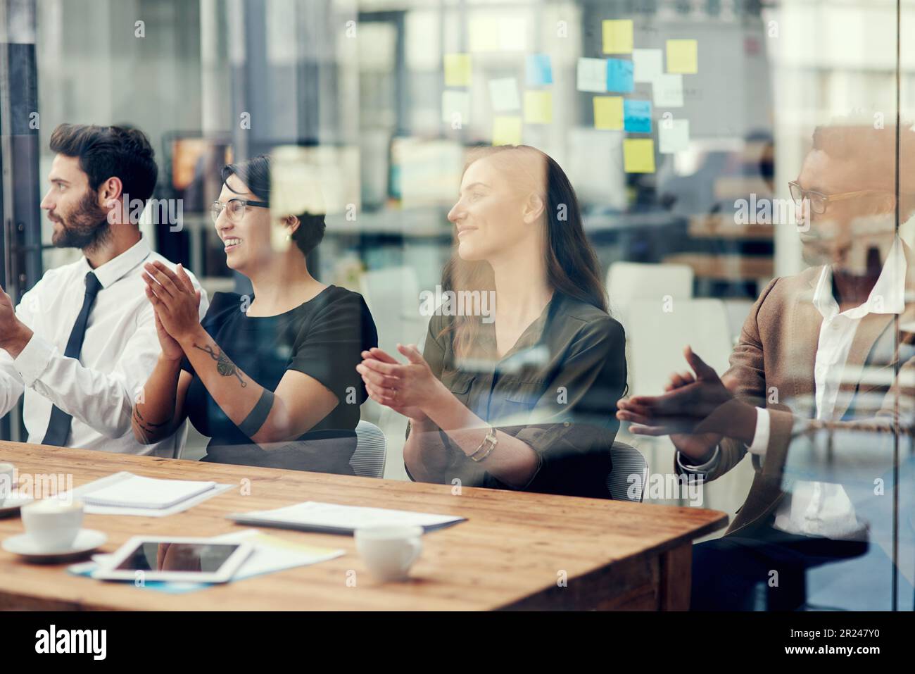 Business meeting, applause and people cheering n support of ...