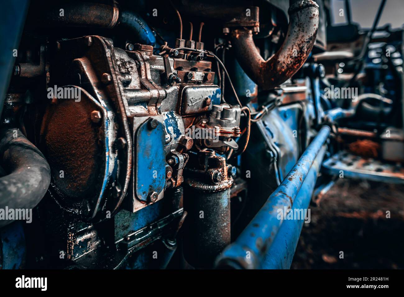 A close-up of the front end of a blue antique steam engine Stock Photo ...