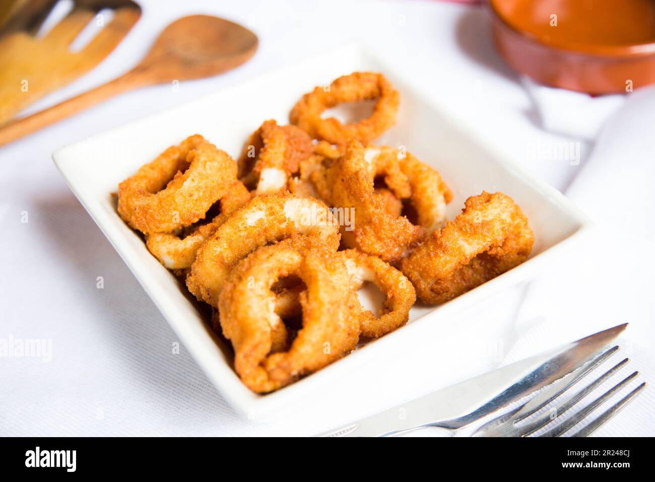 Spanish tapa of squid rings Roman style Stock Photo - Alamy