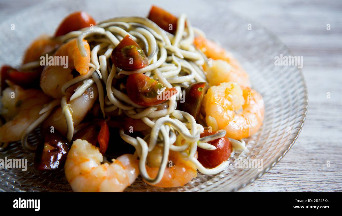 Garlic prawns with eels. Shrimp Scampi. Traditional tapas recipe from ...