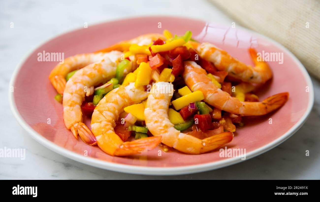 Prawn tail salad with colored peppers and mango Stock Photo - Alamy