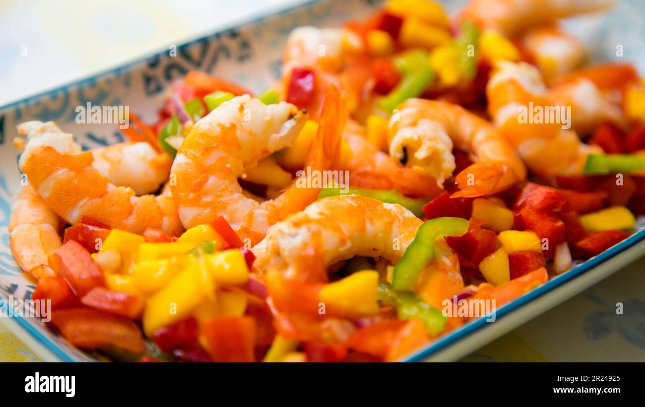 Prawn tail salad with colored peppers and mango Stock Photo - Alamy