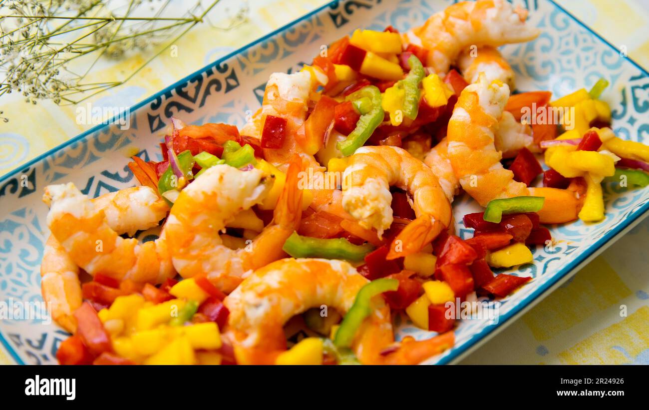 Prawn tail salad with colored peppers and mango Stock Photo - Alamy