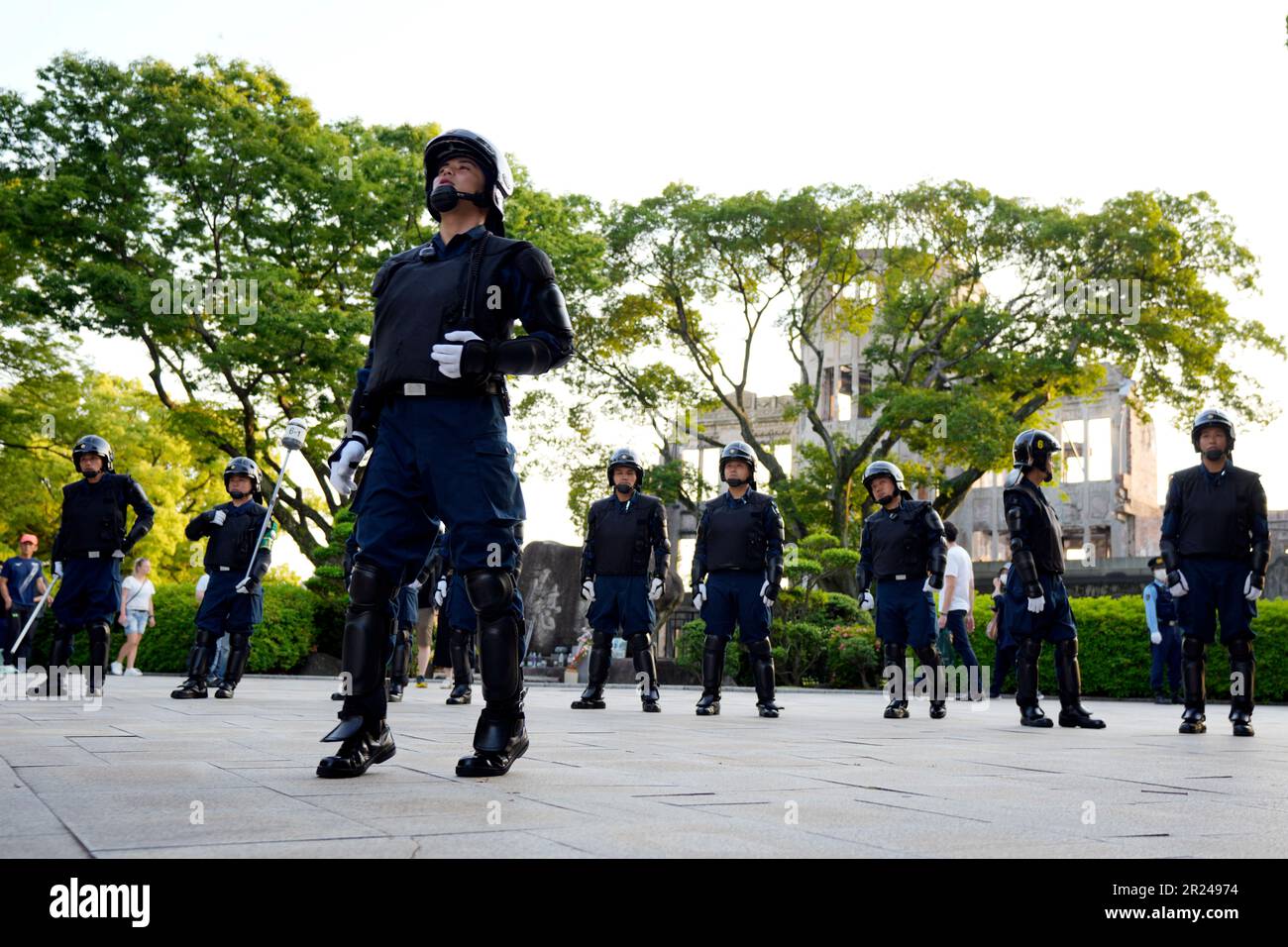 Police officers stand guard near the famed Atomic Bomb Dome as Japan's ...