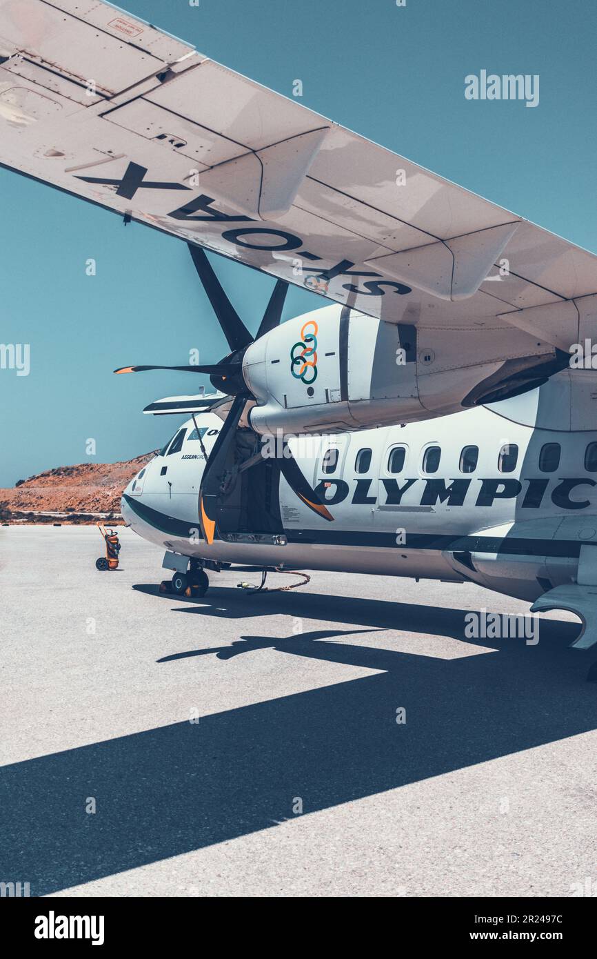 Olympic propeller plane on the runway Stock Photo - Alamy