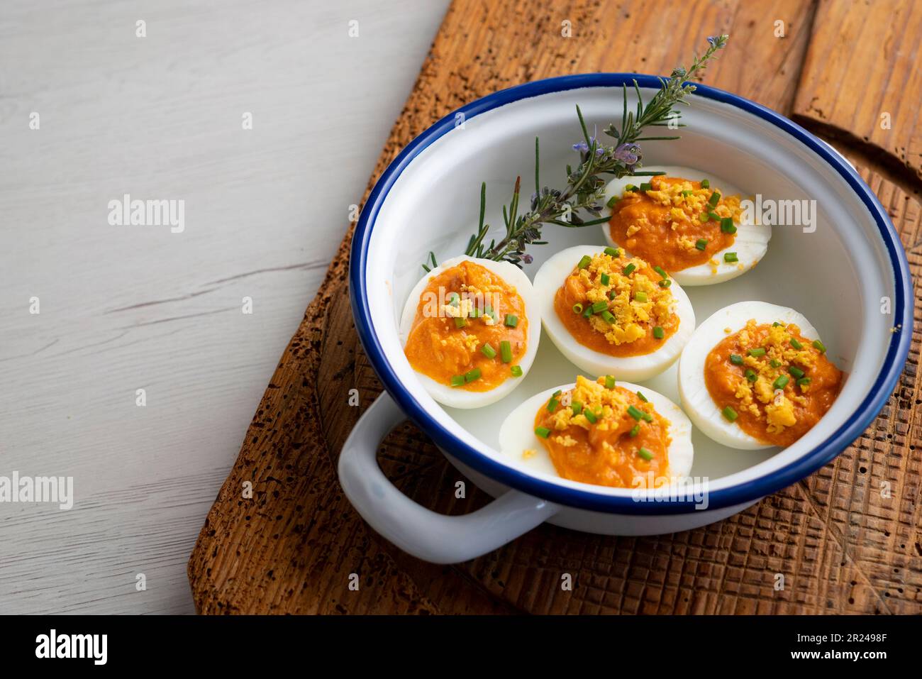 Eggs stuffed with tuna and tomato cream. Traditional Spanish tapa ...