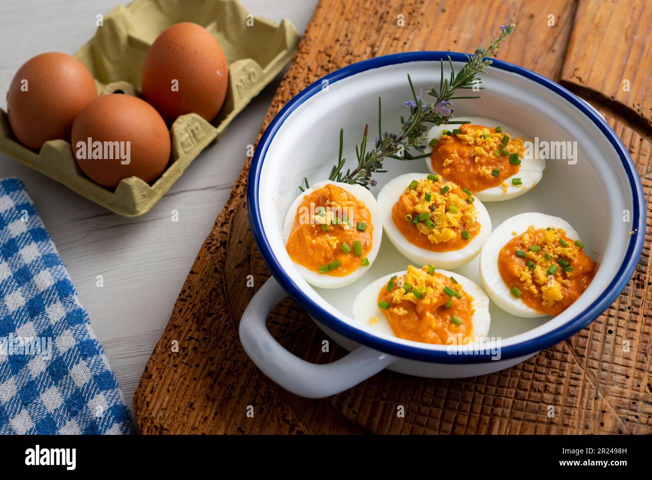 Eggs stuffed with tuna and tomato cream. Traditional Spanish tapa ...