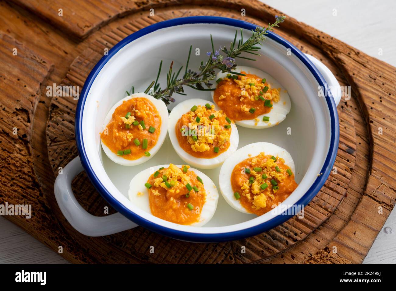 Eggs stuffed with tuna and tomato cream. Traditional Spanish tapa ...