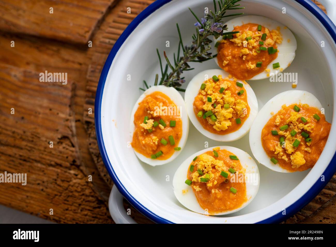 Eggs stuffed with tuna and tomato cream. Traditional Spanish tapa ...