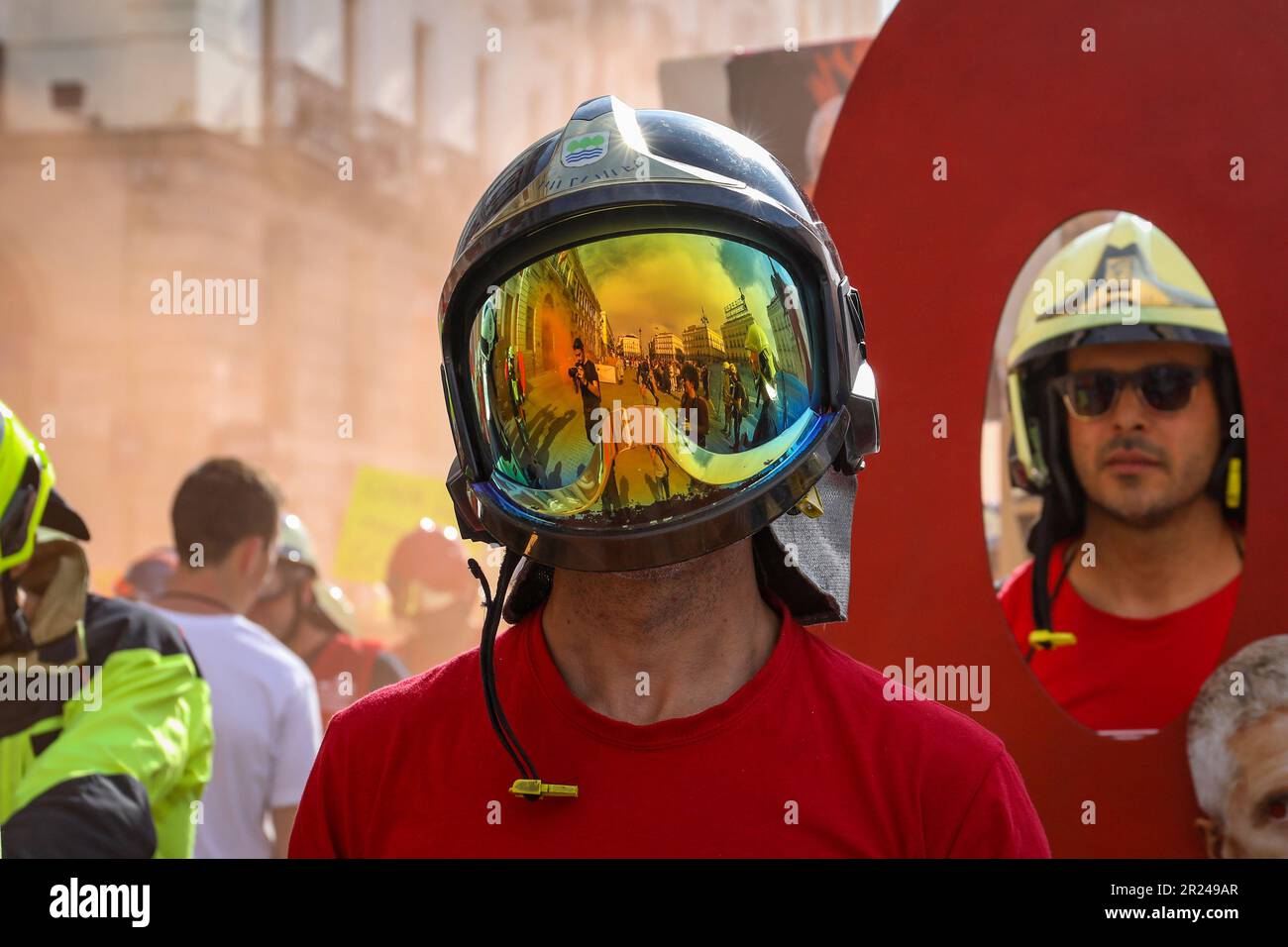 Madrid, Spain. 16th May, 2023. A firefighter seen wearing a helmet ...