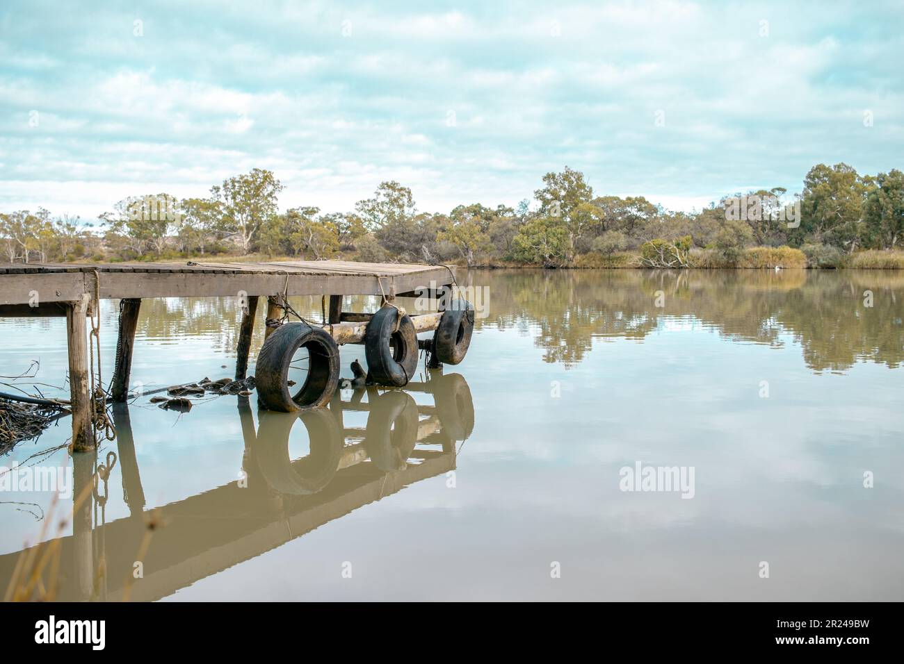empty wooden jetty on the river Stock Photo - Alamy