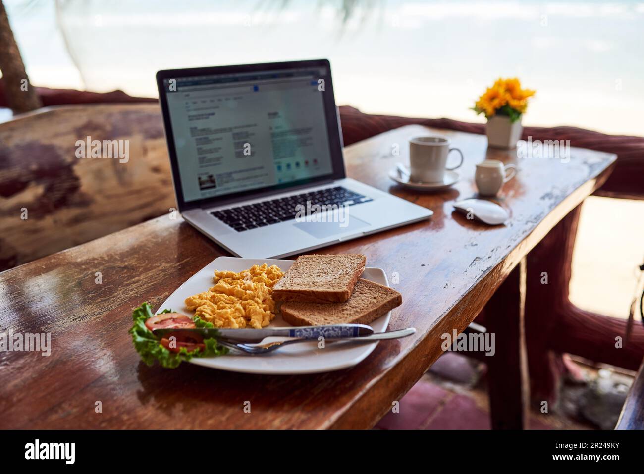 Cafe food, laptop or breakfast by a beach for remote workspace in the ...