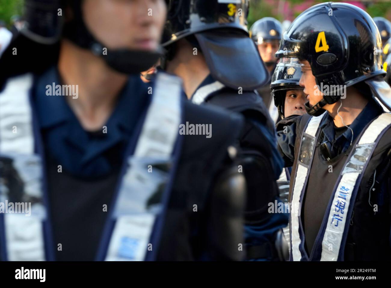 Police officers stand guard near the famed Atomic Bomb Dome as Japan's ...