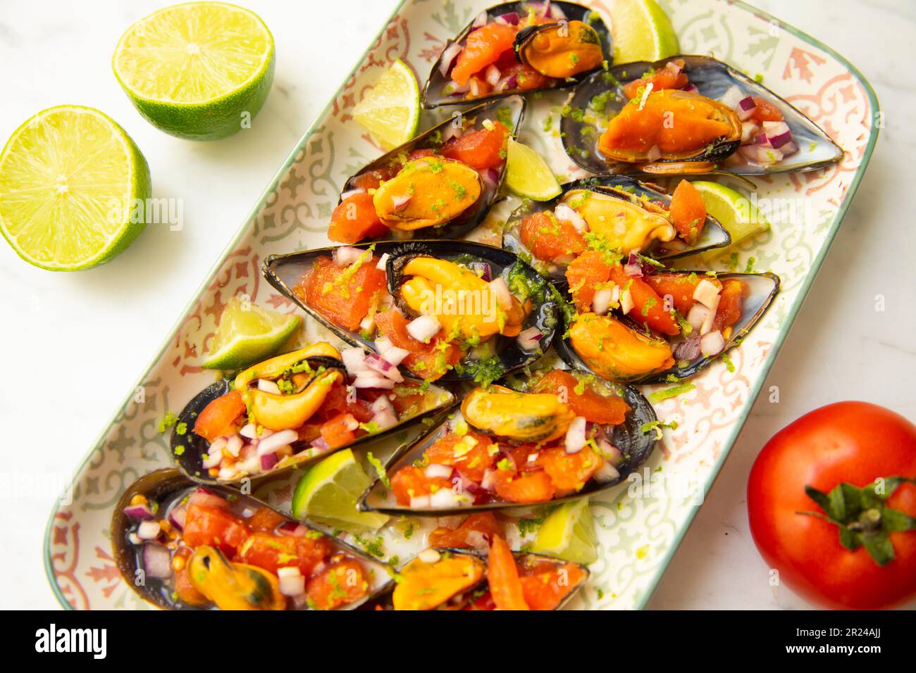 Steamed mussels with vegetables and sauce. Traditional Spanish tapa ...
