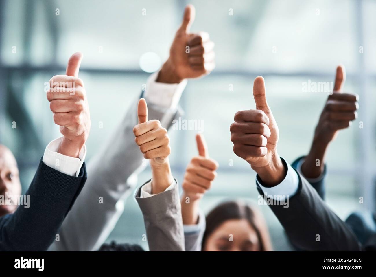 Success, thumbs up and teamwork of people with thank you, support or group hands for vote, yes ...