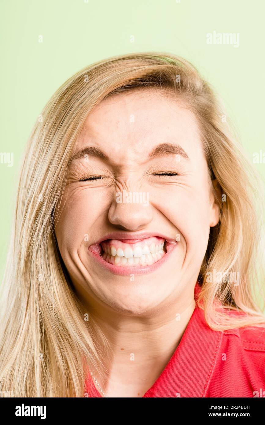 My face shows all my excitement. an attractive young woman standing ...