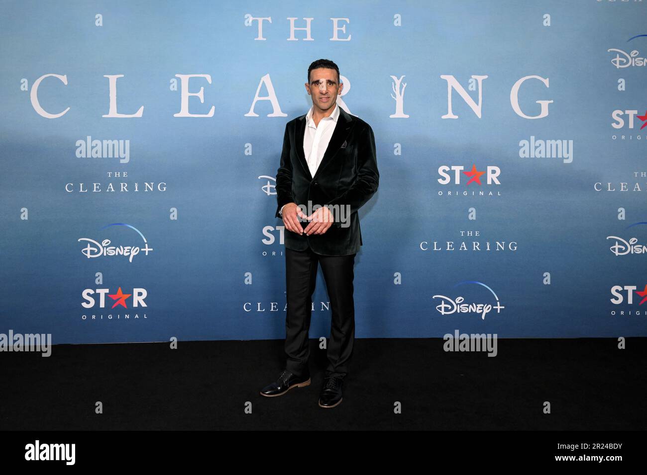 Hazem Shammas poses for a photograph on the red carpet at the premiere ...