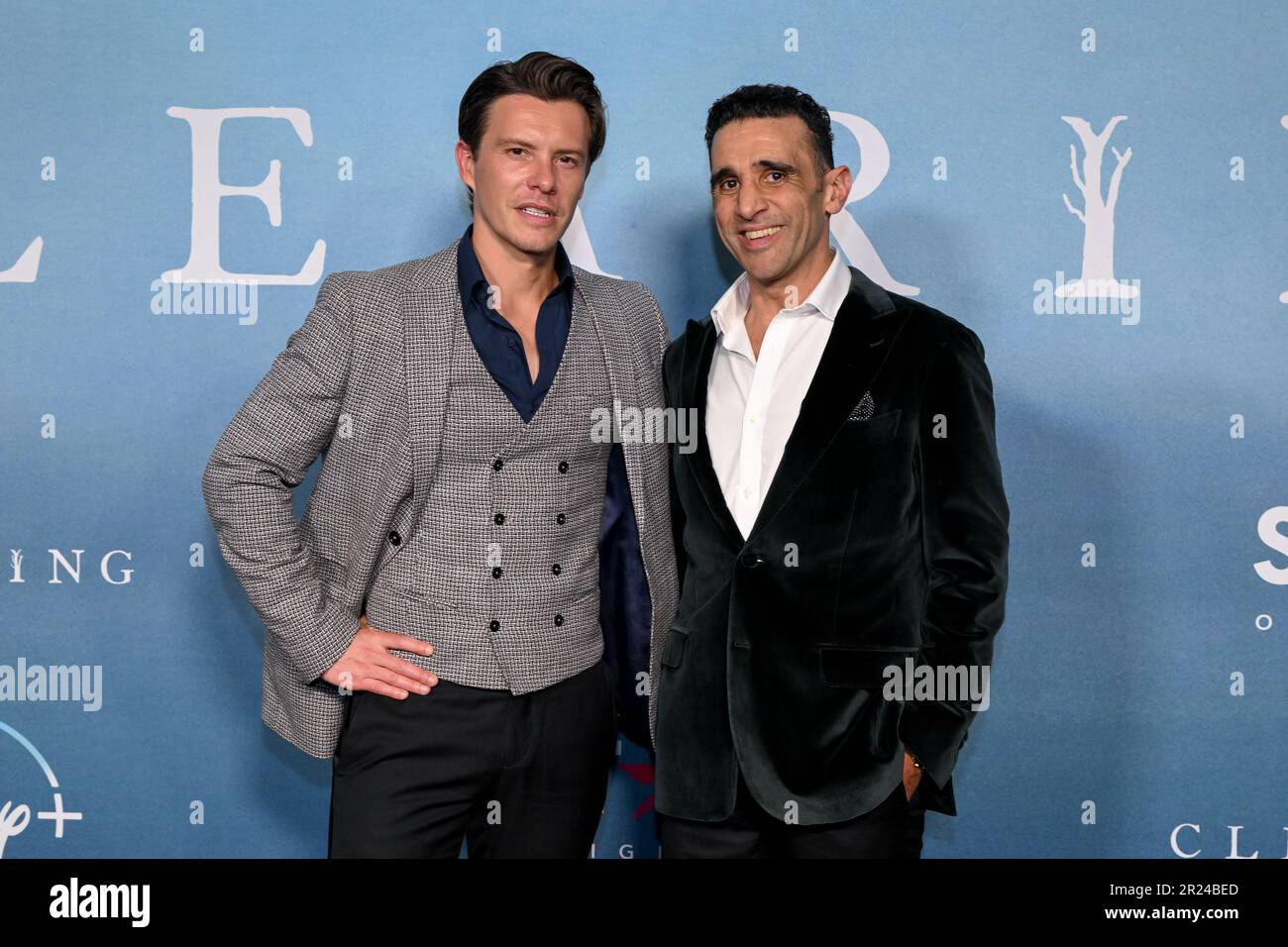 Xavier Samuels and Hazem Shammas pose for a photograph on the red ...