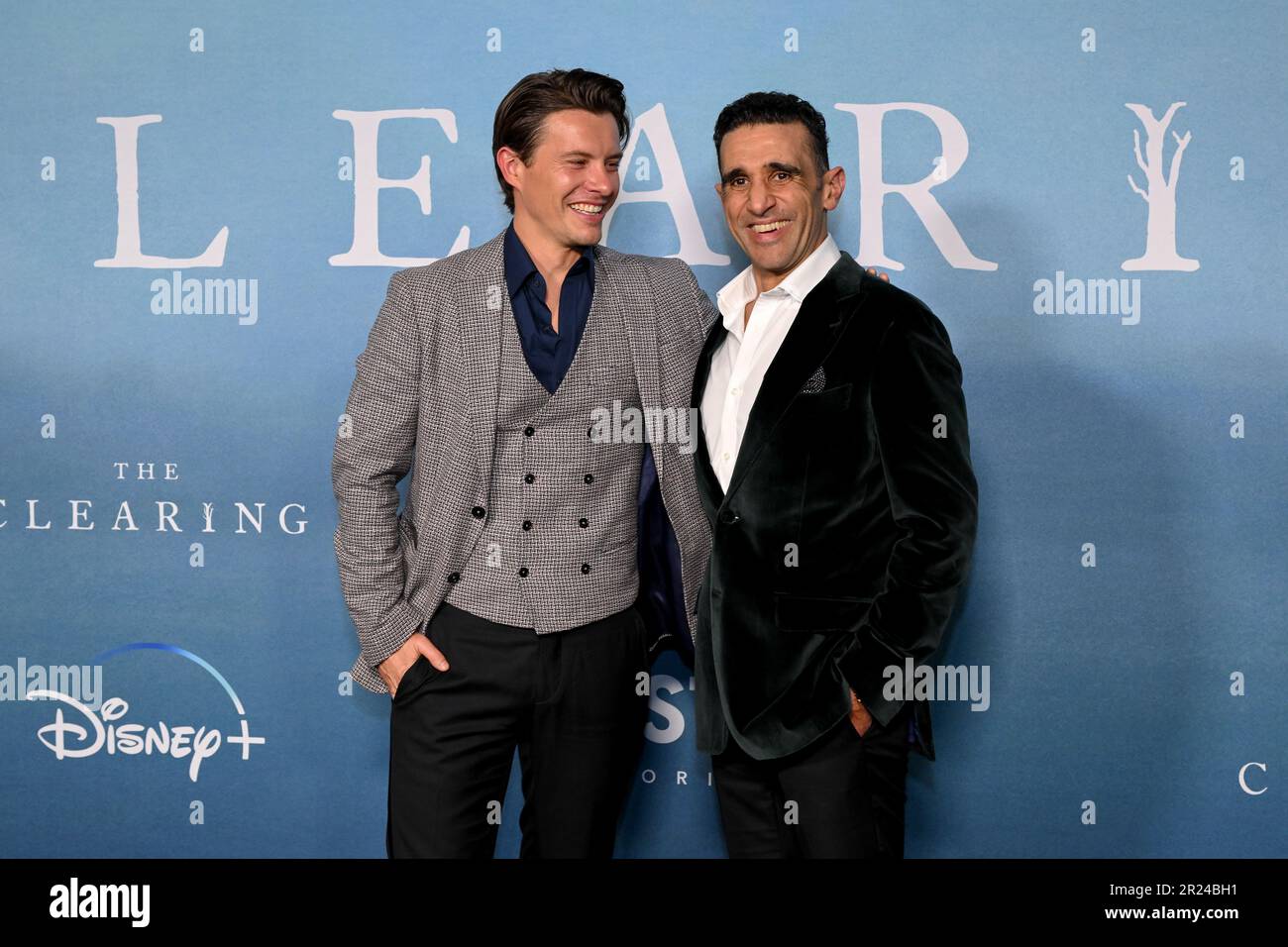 Xavier Samuels and Hazem Shammas pose for a photograph on the red ...