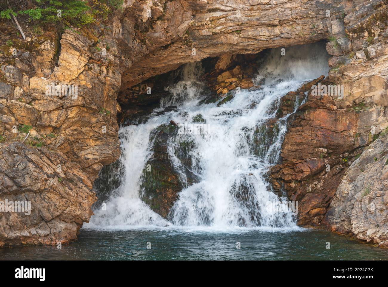 Running Eagle Falls in Glacier National Park Stock Photo - Alamy
