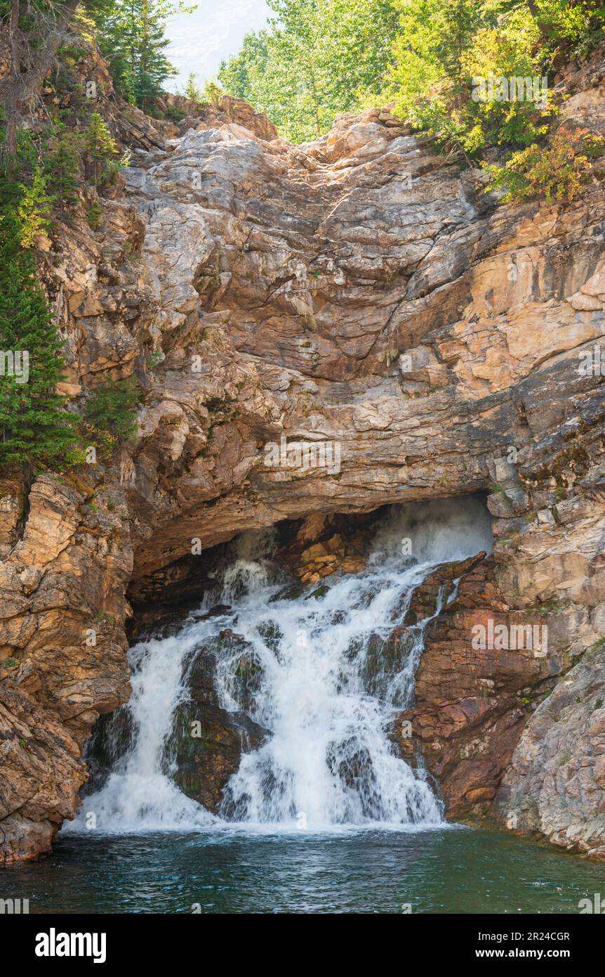 Running Eagle Falls in Glacier National Park Stock Photo - Alamy