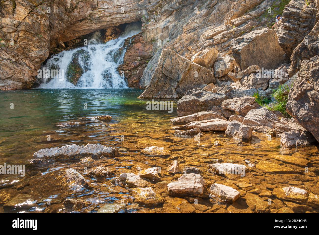 Running Eagle Falls in Glacier National Park Stock Photo - Alamy