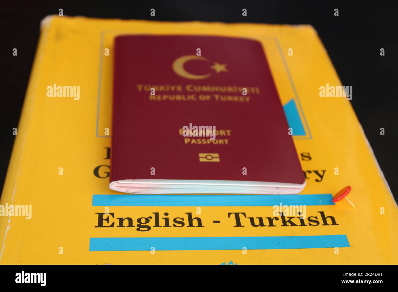english turkish dictionary and turkish burgundy passport Stock Photo ...