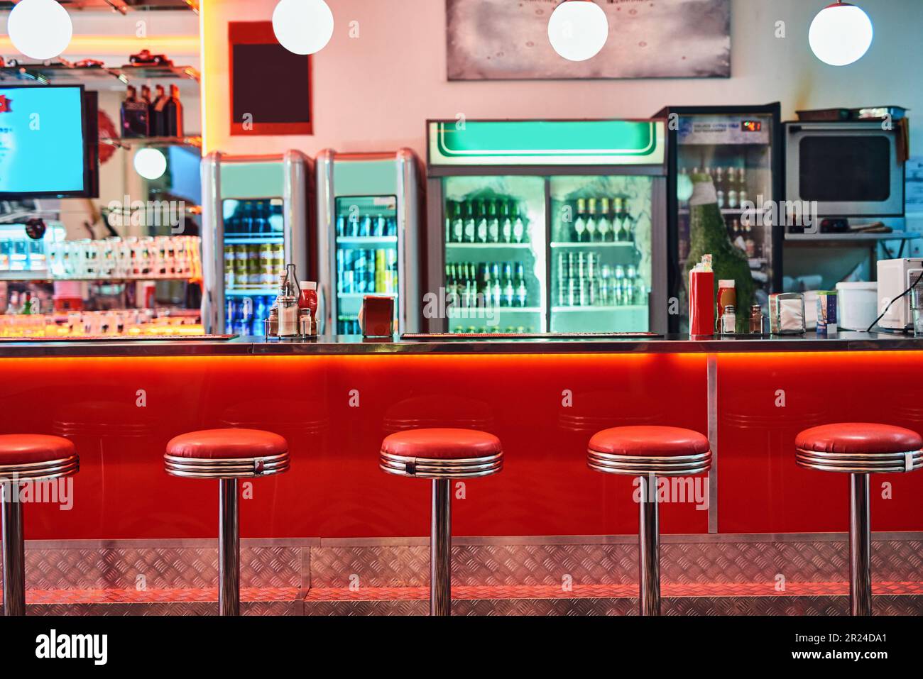 Retro, vintage and stools with interior in a diner, restaurant or ...