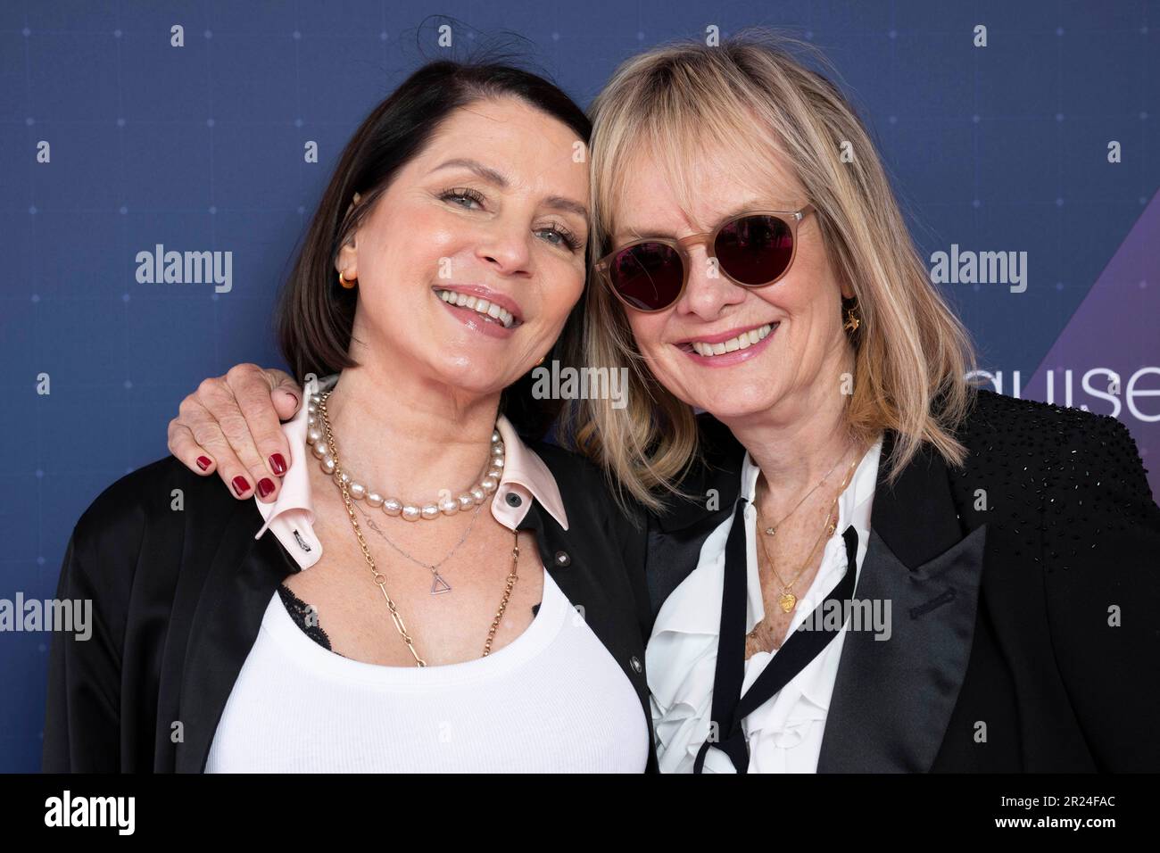 Director Sadie Frost, left, and Twiggy pose for photographers during ...