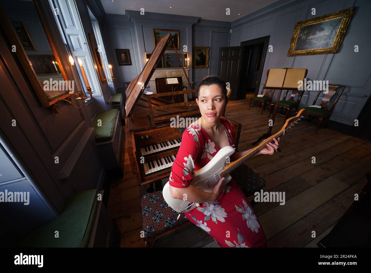 Handel Hendrix House staff member Rebecca Stephenson poses with an ...