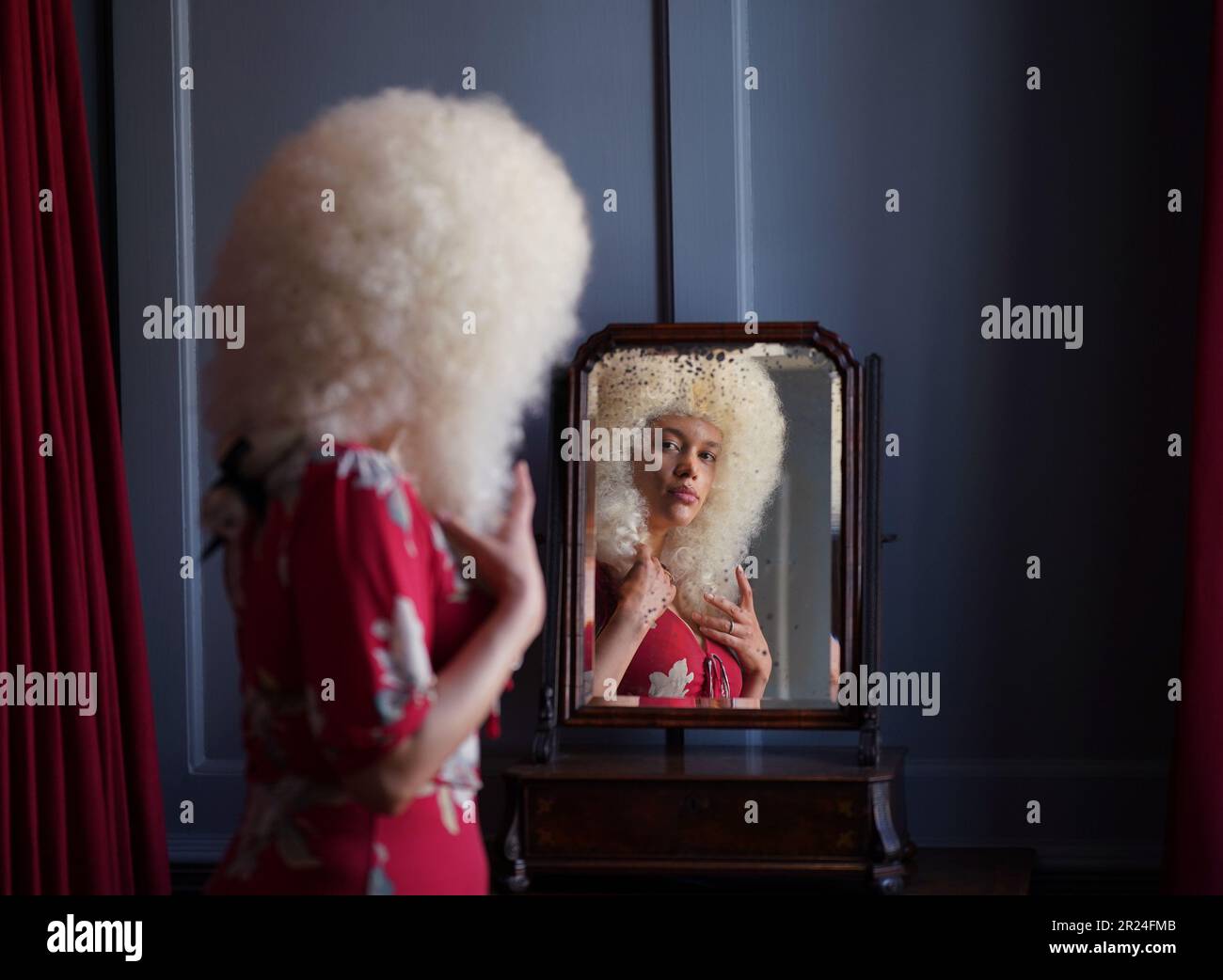 Handel Hendrix House staff member Rebecca Stephenson is reflected in a ...