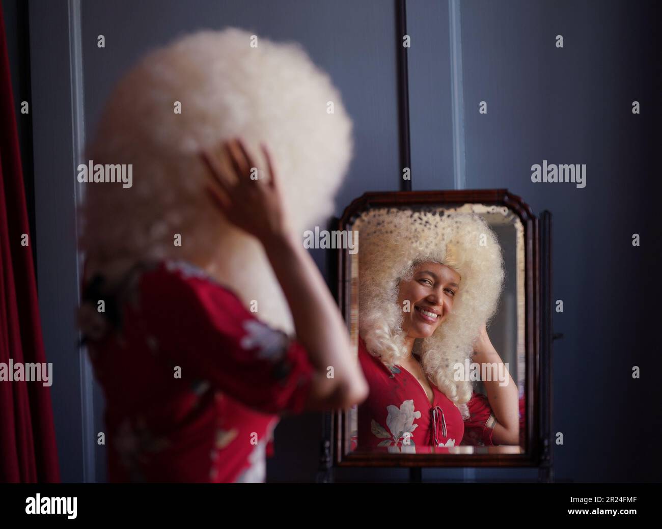 Handel Hendrix House staff member Rebecca Stephenson is reflected in a ...