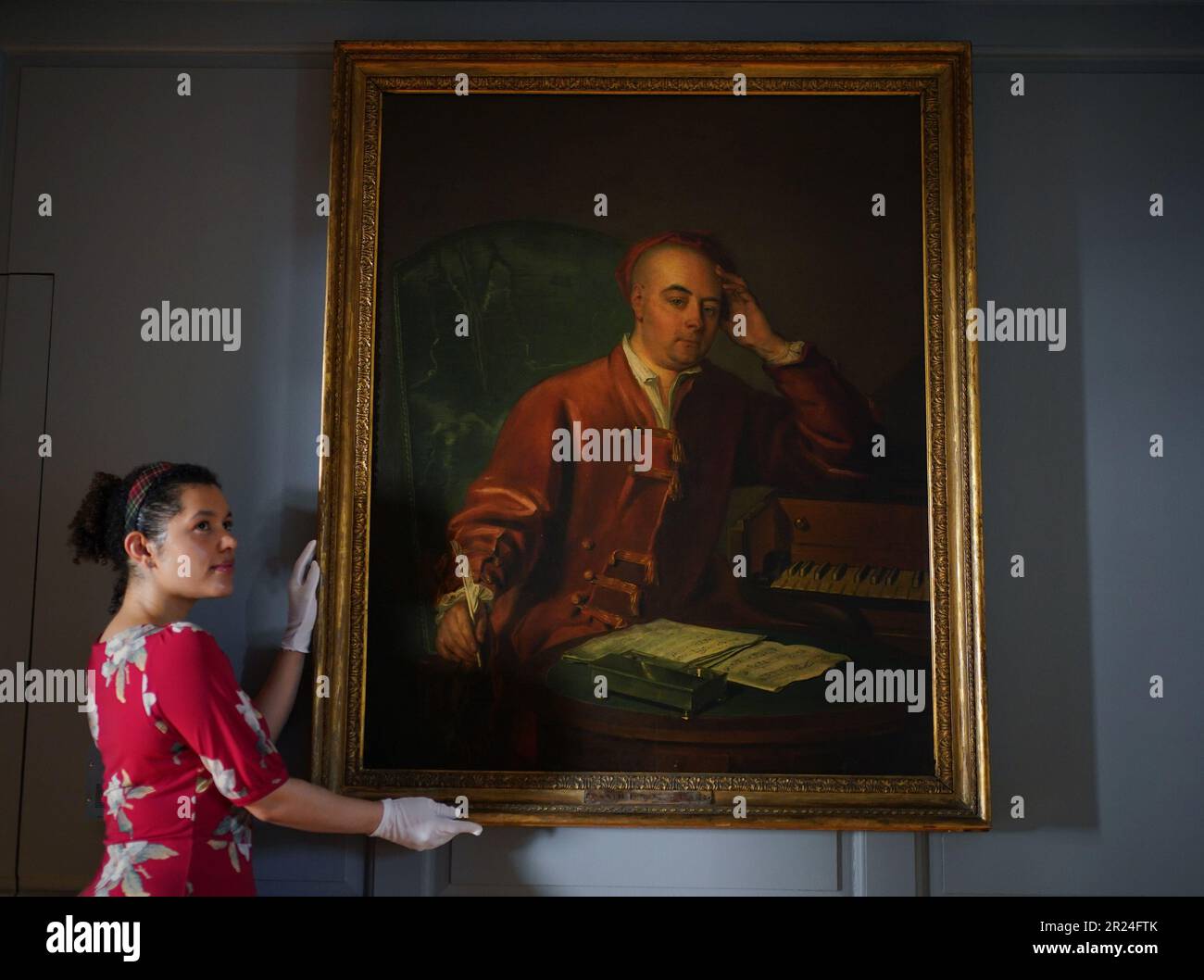 Handel Hendrix House staff member Rebecca Stephenson poses next to a ...