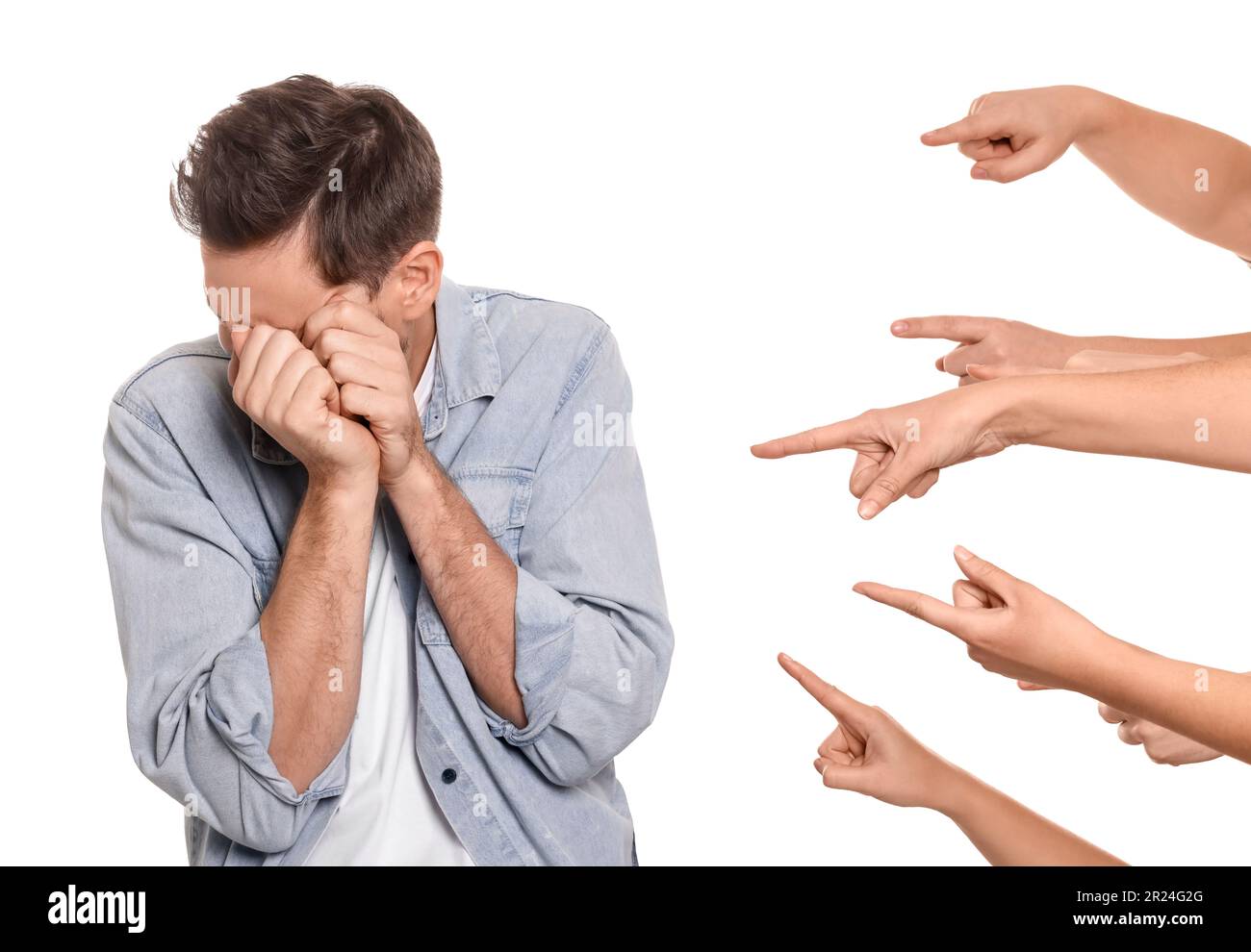 People bullying scared man on white background Stock Photo - Alamy