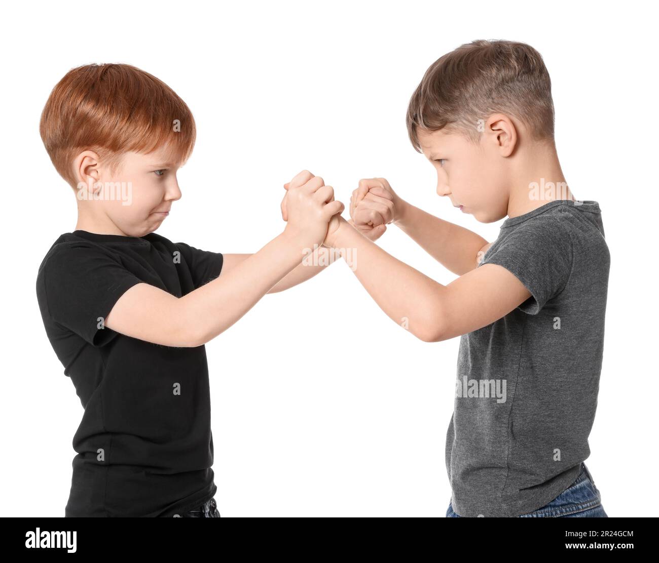 Two boys fighting on white background. Children's bullying Stock Photo ...