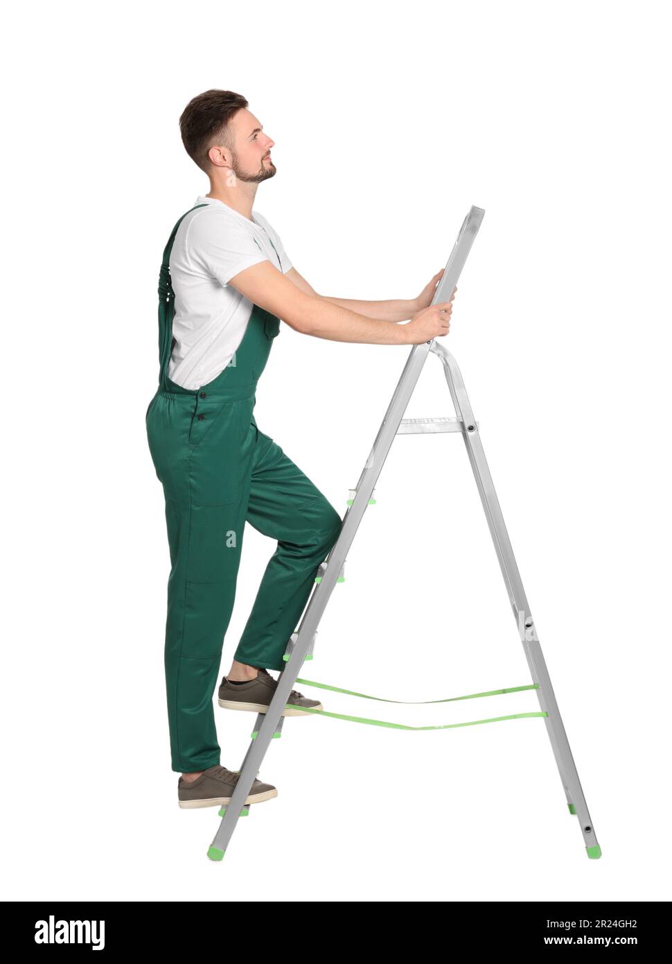 Construction worker climbing ladder Cut Out Stock Images & Pictures - Alamy