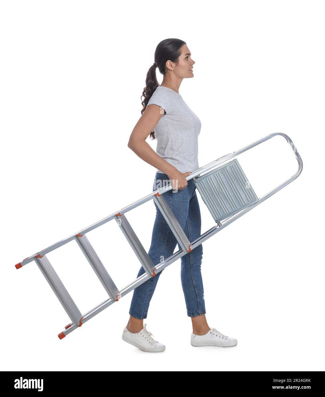 Young woman holding metal ladder on white background Stock Photo - Alamy