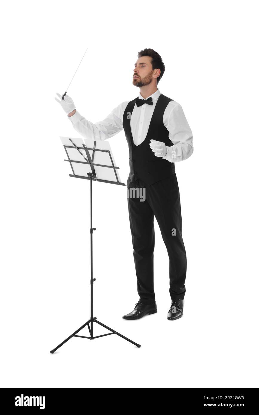 Professional conductor with baton and note stand on white background ...
