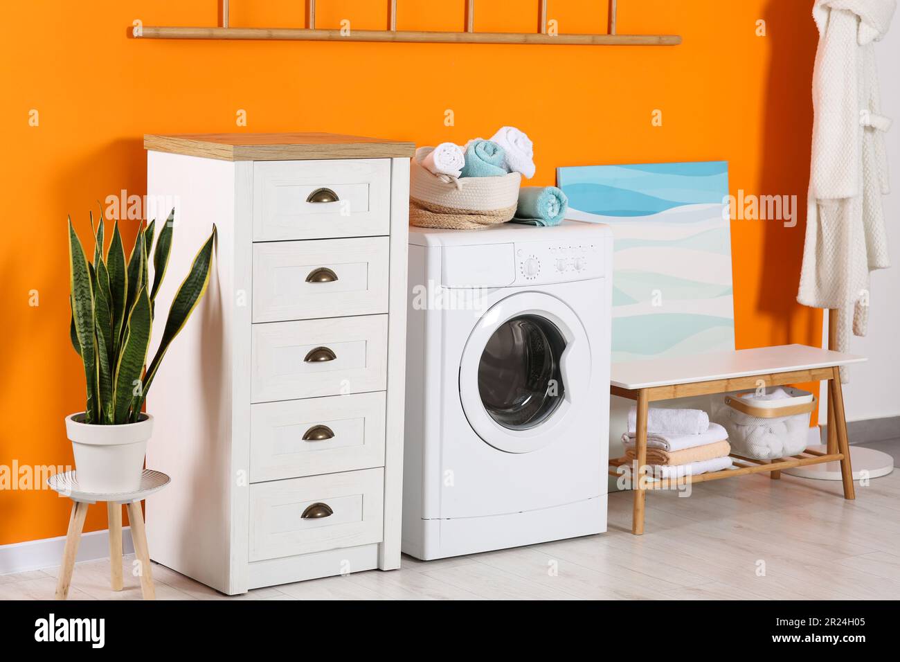 Stylish laundry room with washing machine. Interior design Stock Photo ...