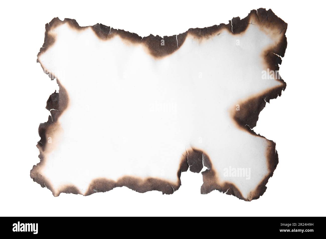 Piece of paper with dark burnt borders on white background, top view ...