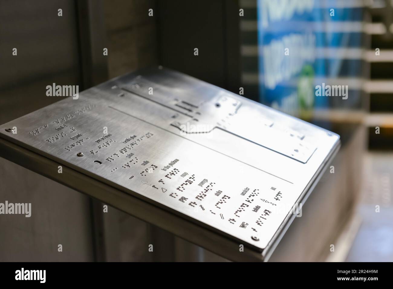 Silver stand with Braille text and building plan indoors, closeup Stock ...