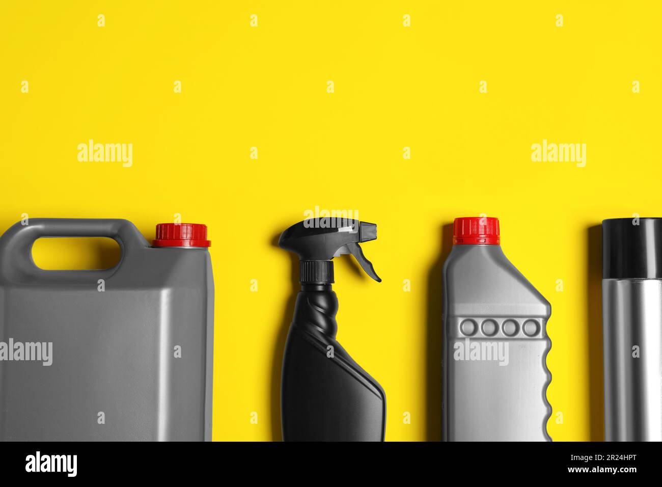 Different car products on yellow background, flat lay. Space for text ...